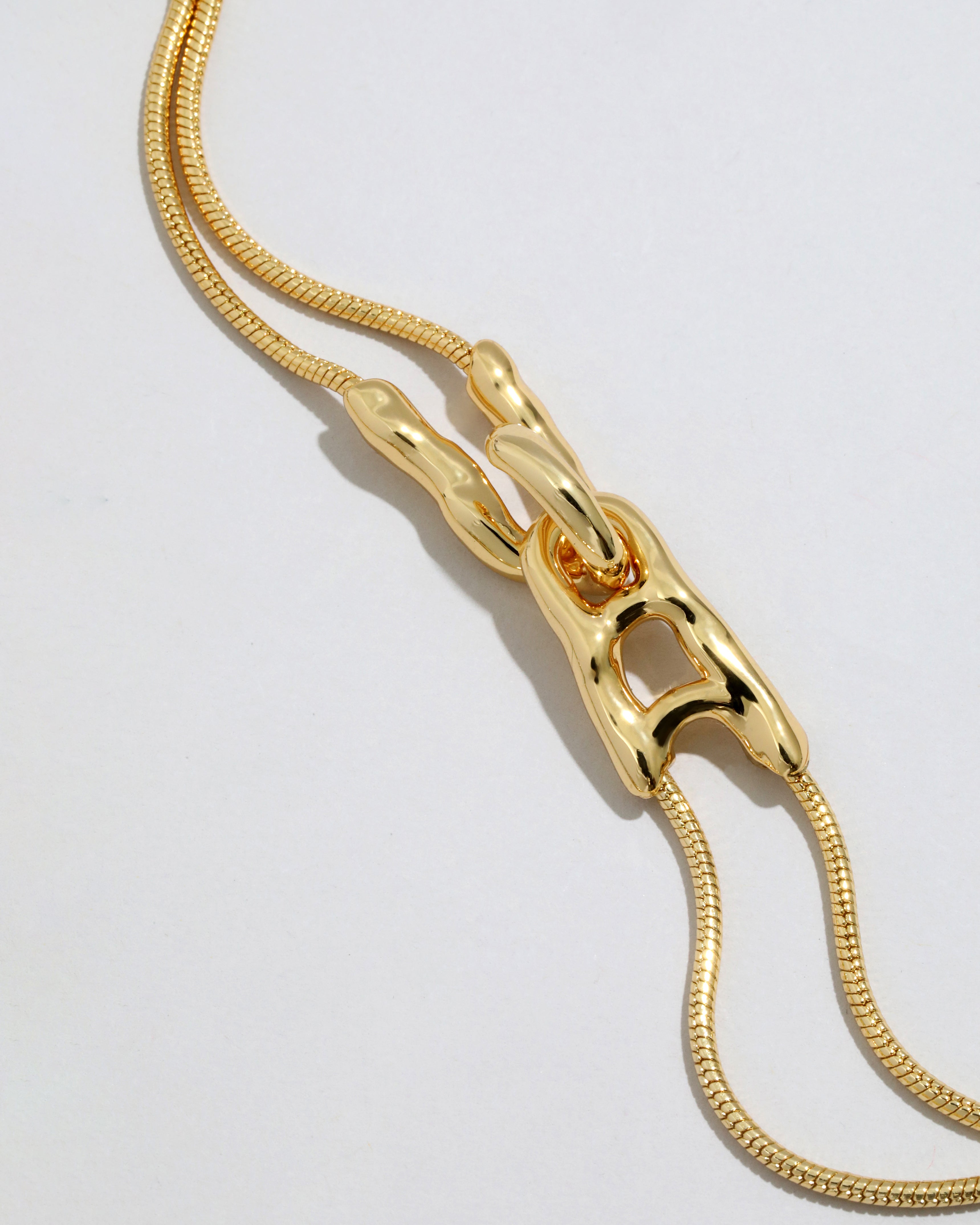 Solanales Gold Crystal Interlock Necklace | Alexis Bittar