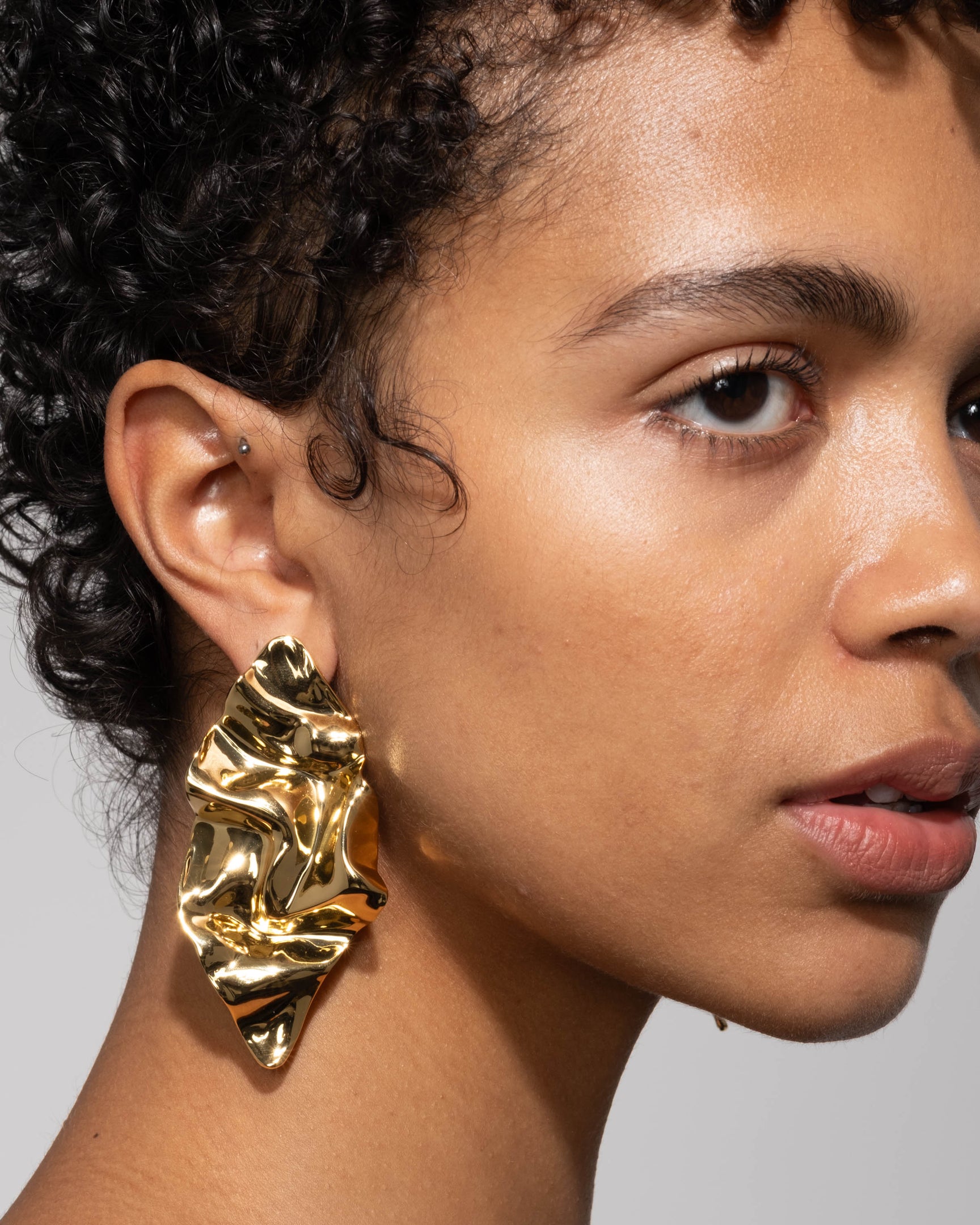 Big Gold Earrings: Crumpled Gold Post Earrings | Alexis Bittar